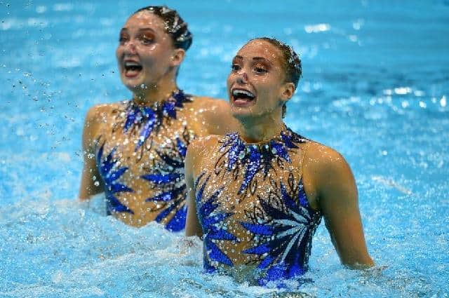 The Faces of Synchronized Swimming (25 Pics)